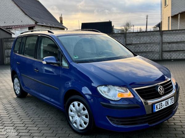 Blue Volkswagen Touran 2008 in Kaunas, with an engine capacity of 1.90 L and mileage of 250 thousand km for 3550 €, photo 4 on AUTOMOTO.COM.LV