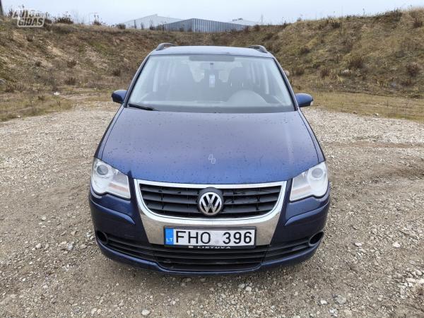 Blue Volkswagen Touran 2008 in Vilnius, with an engine capacity of 1.90 L and mileage of 425 thousand km for 900 €, photo 4 on AUTOMOTO.COM.LV