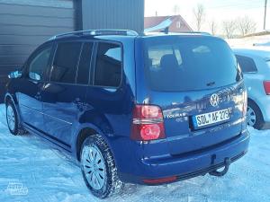 Blue Volkswagen Touran 2008 in Mazeikiai, with an engine capacity of 2.00 L and mileage of 272 thousand km for 4150 €, photo 6 on AUTOMOTO.COM.LV