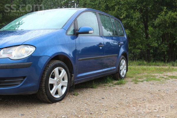 Zils Volkswagen Touran 2008 Madona, ar dzinēja tilpumu 1.90 L un nobraukumu 486 tūkst. km par 2500 €, foto 1 vietnē AUTOMOTO.COM.LV
