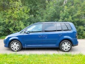 Blue Volkswagen Touran 2008 in Riga, with an engine capacity of 1.40 L and mileage of 169 thousand km for 4990 €, photo  on AUTOMOTO.COM.LV