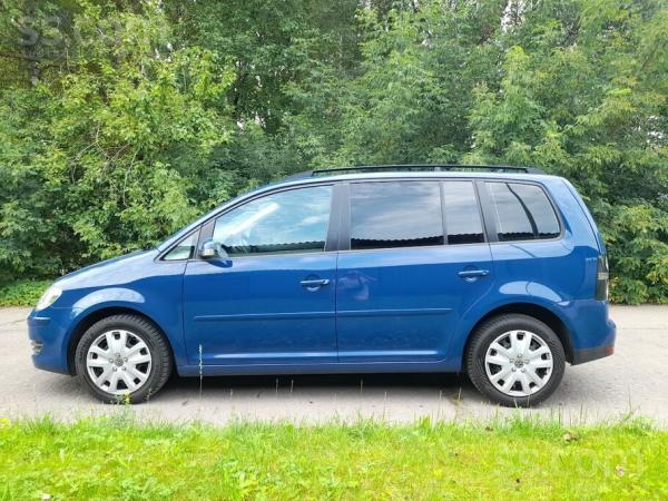 Blue Volkswagen Touran 2008 in Riga, with an engine capacity of 1.40 L and mileage of 169 thousand km for 4990 €, photo 1 on AUTOMOTO.COM.LV