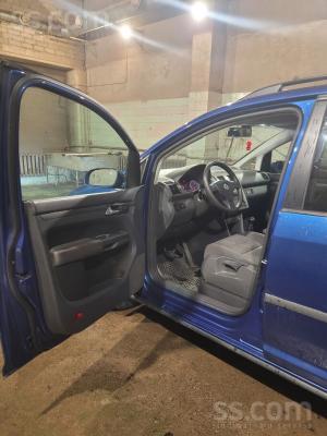 Zils Volkswagen Touran 2008 Daugavpils, ar dzinēja tilpumu 1.90 L un nobraukumu 382 tūkst. km par 1800 €, foto 13 vietnē AUTOMOTO.COM.LV