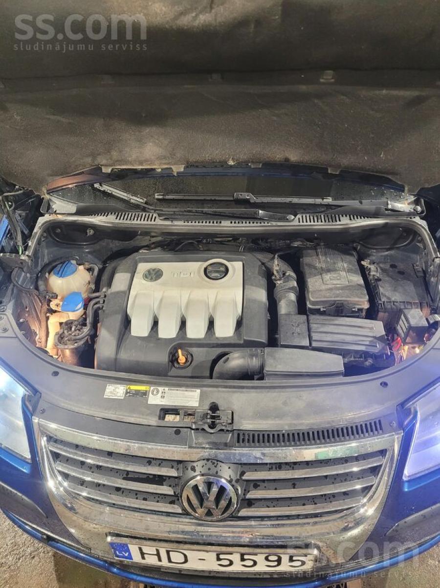 Zils Volkswagen Touran 2008 Daugavpils, ar dzinēja tilpumu 1.90 L un nobraukumu 382 tūkst. km par 1800 €, foto 14 vietnē AUTOMOTO.COM.LV