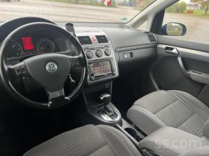 Blue Volkswagen Touran 2008 in Jekabpils, with an engine capacity of 2.00 L and mileage of 331 thousand km for 3400 €, photo 11 on AUTOMOTO.COM.LV