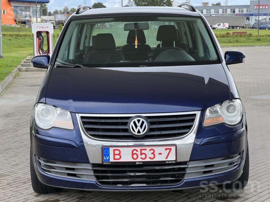 Blue Volkswagen Touran 2008 in Rezekne, with an engine capacity of 1.40 L and mileage of 307 thousand km for 4690 €, photo 1 on AUTOMOTO.COM.LV