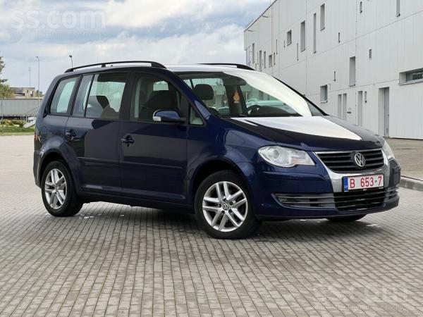Zils Volkswagen Touran 2008 Rēzekne, ar dzinēja tilpumu 1.40 L un nobraukumu 307 tūkst. km par 4690 €, foto 4 vietnē AUTOMOTO.COM.LV