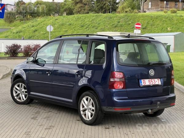 Zils Volkswagen Touran 2008 Rēzekne, ar dzinēja tilpumu 1.40 L un nobraukumu 307 tūkst. km par 4690 €, foto 5 vietnē AUTOMOTO.COM.LV