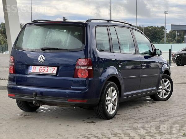 Zils Volkswagen Touran 2008 Rēzekne, ar dzinēja tilpumu 1.40 L un nobraukumu 307 tūkst. km par 4690 €, foto 6 vietnē AUTOMOTO.COM.LV