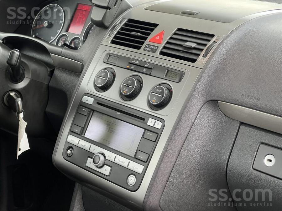 Blue Volkswagen Touran 2008 in Rezekne, with an engine capacity of 1.40 L and mileage of 307 thousand km for 4690 €, photo 13 on AUTOMOTO.COM.LV