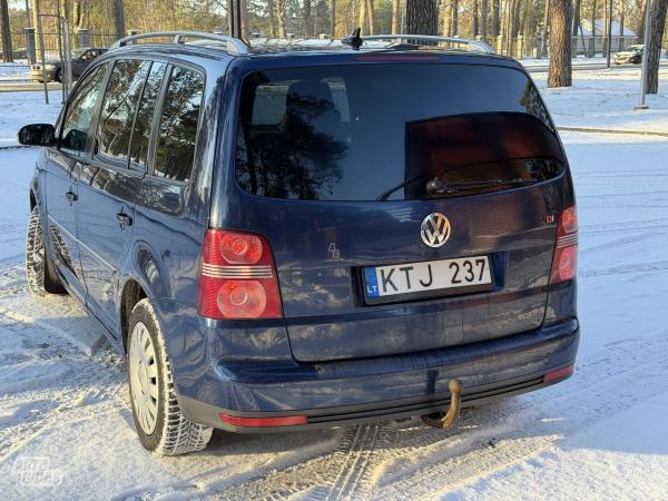 Zils Volkswagen Touran 2009 Alīta, ar dzinēja tilpumu 2.00 L un nobraukumu 375 tūkst. km par 2350 €, foto 4 vietnē AUTOMOTO.COM.LV