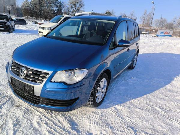 Blue Volkswagen Touran 2009 in Alytus, with an engine capacity of 1.39 L and mileage of 150 thousand km for 4800 €, photo 3 on AUTOMOTO.COM.LV