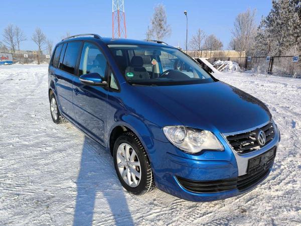 Blue Volkswagen Touran 2009 in Alytus, with an engine capacity of 1.39 L and mileage of 150 thousand km for 4800 €, photo 4 on AUTOMOTO.COM.LV