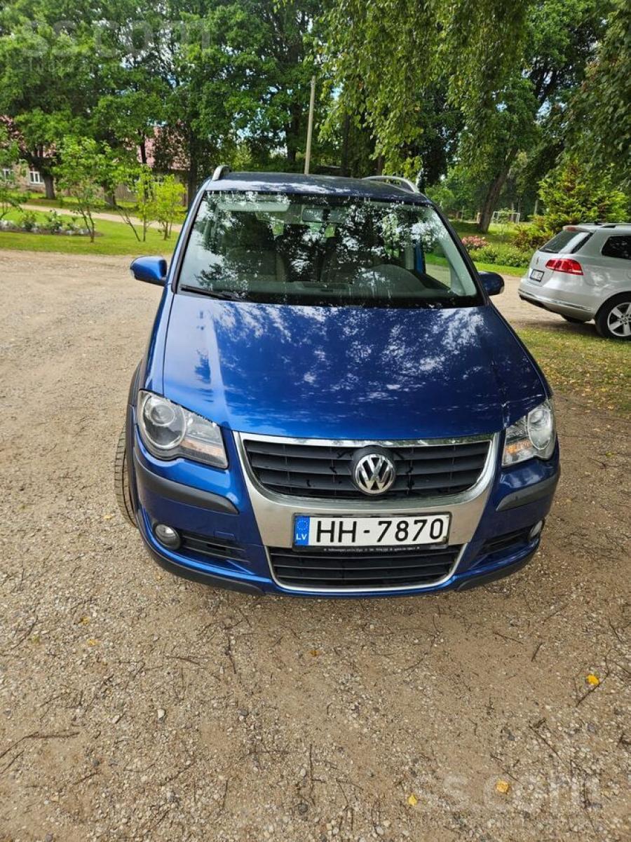 Zils Volkswagen Touran 2009 Valmiera, ar dzinēja tilpumu 2.00 L un nobraukumu 186 tūkst. km par 2990 €, foto 1 vietnē AUTOMOTO.COM.LV