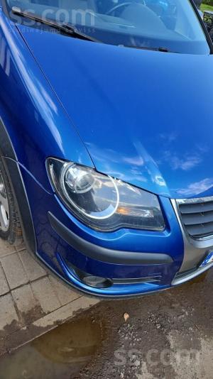 Zils Volkswagen Touran 2009 Valmiera, ar dzinēja tilpumu 2.00 L un nobraukumu 186 tūkst. km par 2990 €, foto 5 vietnē AUTOMOTO.COM.LV