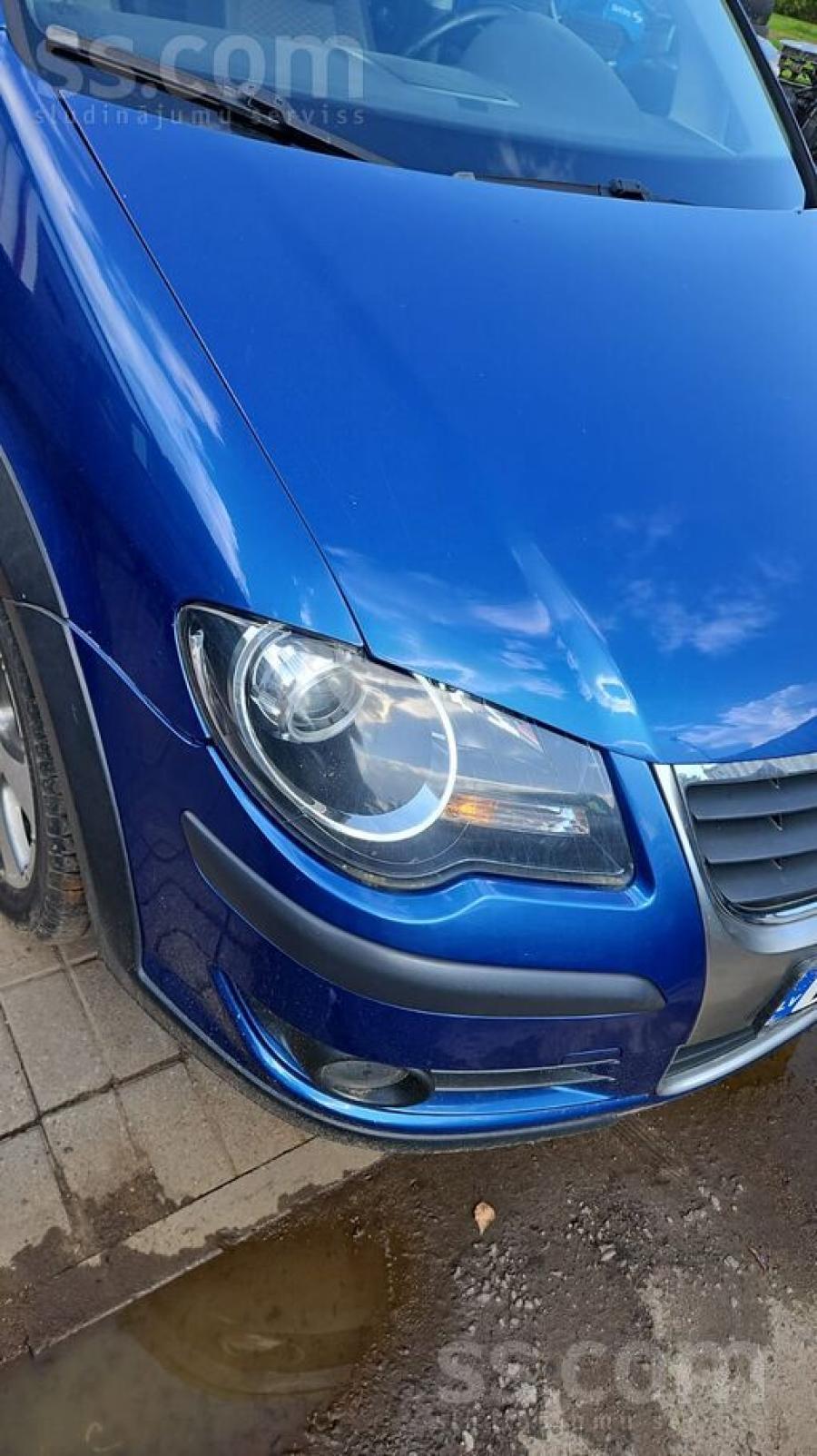 Zils Volkswagen Touran 2009 Valmiera, ar dzinēja tilpumu 2.00 L un nobraukumu 186 tūkst. km par 2990 €, foto 5 vietnē AUTOMOTO.COM.LV