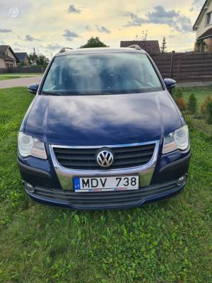 Blue Volkswagen Touran 2009 in Kaisiadorys, with an engine capacity of 1.90 L and mileage of 397 thousand km for 1849 €, photo  on AUTOMOTO.COM.LV