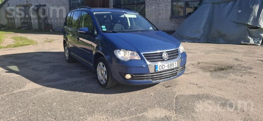 Zils Volkswagen Touran 2010 Rēzekne, ar dzinēja tilpumu 2.00 L un nobraukumu 251 tūkst. km par 4250 €, foto 1 vietnē AUTOMOTO.COM.LV