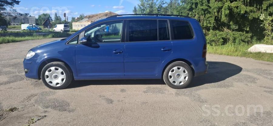 Zils Volkswagen Touran 2010 Rēzekne, ar dzinēja tilpumu 2.00 L un nobraukumu 251 tūkst. km par 4250 €, foto 6 vietnē AUTOMOTO.COM.LV