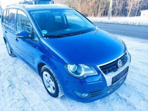 Blue Volkswagen Touran 2010 in Utena, with an engine capacity of 1.39 L and mileage of 256 thousand km for 3100 €, photo  on AUTOMOTO.COM.LV