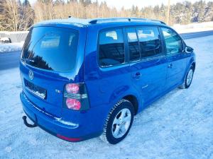 Blue Volkswagen Touran 2010 in Utena, with an engine capacity of 1.39 L and mileage of 256 thousand km for 3100 €, photo 2 on AUTOMOTO.COM.LV