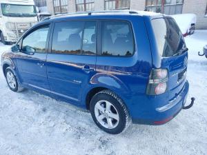 Blue Volkswagen Touran 2010 in Utena, with an engine capacity of 1.39 L and mileage of 256 thousand km for 3100 €, photo 6 on AUTOMOTO.COM.LV