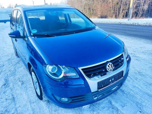 Zils Volkswagen Touran 2010 Utena, ar dzinēja tilpumu 1.39 L un nobraukumu 256 tūkst. km par 3100 €, foto 7 vietnē AUTOMOTO.COM.LV