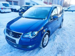 Blue Volkswagen Touran 2010 in Utena, with an engine capacity of 1.39 L and mileage of 256 thousand km for 3100 €, photo 9 on AUTOMOTO.COM.LV