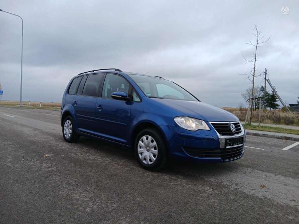 Blue Volkswagen Touran 2010 in Marijampole, with an engine capacity of 1.39 L and mileage of 156 thousand km for 3950 €, photo 1 on AUTOMOTO.COM.LV