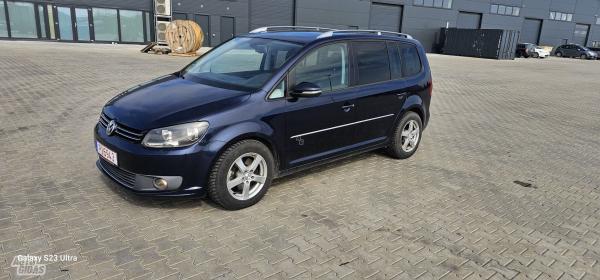 Blue Volkswagen Touran 2010 in Kaunas, with an engine capacity of 2.00 L and mileage of 280 thousand km for 6650 €, photo 1 on AUTOMOTO.COM.LV