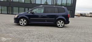 Blue Volkswagen Touran 2010 in Kaunas, with an engine capacity of 2.00 L and mileage of 280 thousand km for 6650 €, photo 3 on AUTOMOTO.COM.LV