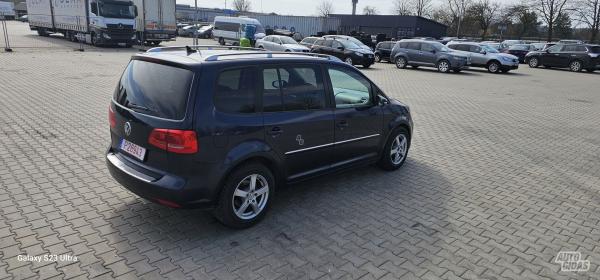 Blue Volkswagen Touran 2010 in Kaunas, with an engine capacity of 2.00 L and mileage of 280 thousand km for 6650 €, photo 5 on AUTOMOTO.COM.LV