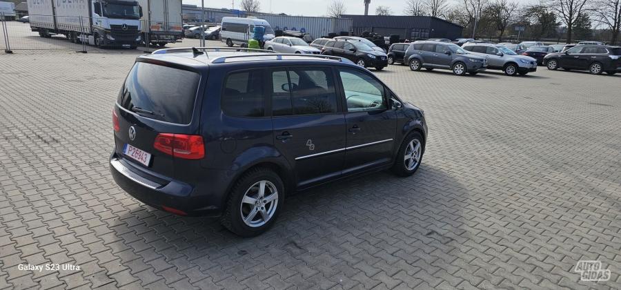 Blue Volkswagen Touran 2010 in Kaunas, with an engine capacity of 2.00 L and mileage of 280 thousand km for 6650 €, photo 6 on AUTOMOTO.COM.LV