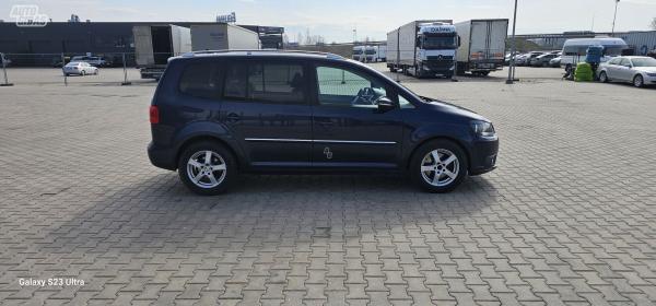 Blue Volkswagen Touran 2010 in Kaunas, with an engine capacity of 2.00 L and mileage of 280 thousand km for 6650 €, photo 6 on AUTOMOTO.COM.LV