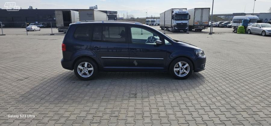Blue Volkswagen Touran 2010 in Kaunas, with an engine capacity of 2.00 L and mileage of 280 thousand km for 6650 €, photo 7 on AUTOMOTO.COM.LV