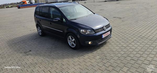 Blue Volkswagen Touran 2010 in Kaunas, with an engine capacity of 2.00 L and mileage of 280 thousand km for 6650 €, photo 8 on AUTOMOTO.COM.LV