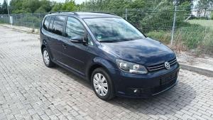 Blue Volkswagen Touran 2010 in Marijampole, with an engine capacity of 1.97 L and mileage of 298 thousand km for 4600 €, photo 4 on AUTOMOTO.COM.LV