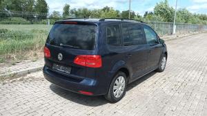 Blue Volkswagen Touran 2010 in Marijampole, with an engine capacity of 1.97 L and mileage of 298 thousand km for 4600 €, photo 7 on AUTOMOTO.COM.LV