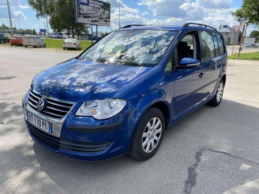 Zils Volkswagen Touran 2010 Tauragė, ar dzinēja tilpumu 1.90 L un nobraukumu 303 tūkst. km par 2900 €, foto 4 vietnē AUTOMOTO.COM.LV