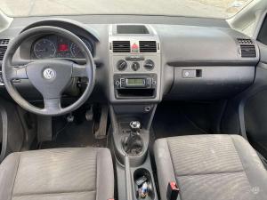 Zils Volkswagen Touran 2010 Tauragė, ar dzinēja tilpumu 1.90 L un nobraukumu 303 tūkst. km par 2900 €, foto 12 vietnē AUTOMOTO.COM.LV