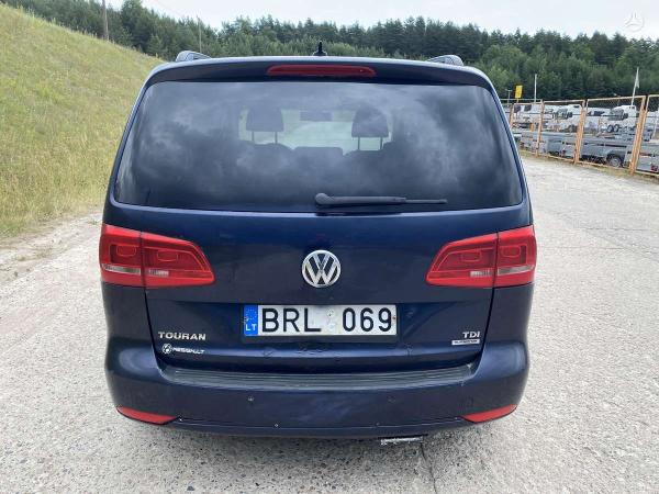 Blue Volkswagen Touran 2010 in Vilnius, with an engine capacity of 1.60 L and mileage of 662 thousand km for 1850 €, photo 5 on AUTOMOTO.COM.LV