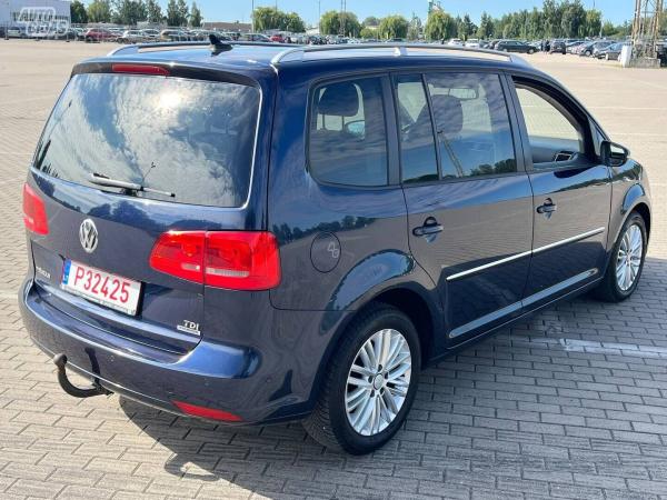 Blue Volkswagen Touran 2010 in Marijampole, with an engine capacity of 1.60 L and mileage of 241 thousand km for 4650 €, photo 4 on AUTOMOTO.COM.LV