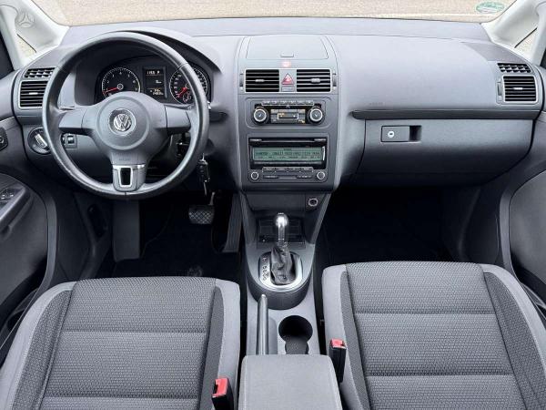 Blue Volkswagen Touran 2011 in Kaunas, with an engine capacity of 1.39 L and mileage of 240 thousand km for 6190 €, photo 11 on AUTOMOTO.COM.LV