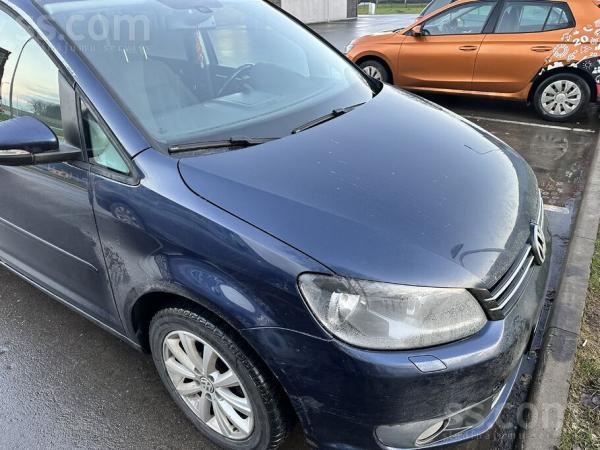 Zils Volkswagen Touran 2011 Jelgava, ar dzinēja tilpumu 2.00 L un nobraukumu 409 tūkst. km par 4500 €, foto 6 vietnē AUTOMOTO.COM.LV