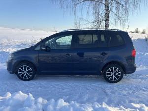 Blue Volkswagen Touran 2011 in Varena, with an engine capacity of 1.60 L and mileage of 257 thousand km for 5300 €, photo 6 on AUTOMOTO.COM.LV
