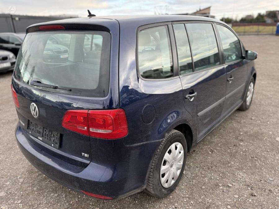 Blue Volkswagen Touran 2011 in Kaunas, with an engine capacity of 1.40 L and mileage of 221 thousand km for 4150 €, photo 5 on AUTOMOTO.COM.LV