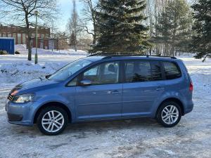 Blue Volkswagen Touran 2011 in Klaipeda, with an engine capacity of 1.39 L and mileage of 250 thousand km for 3999 €, photo 3 on AUTOMOTO.COM.LV