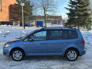 Blue Volkswagen Touran 2011 in Klaipeda, with an engine capacity of 1.39 L and mileage of 250 thousand km for 3999 €, photo 4 on AUTOMOTO.COM.LV