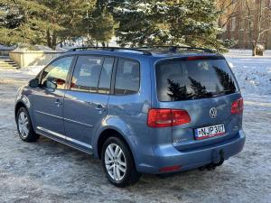 Blue Volkswagen Touran 2011 in Klaipeda, with an engine capacity of 1.39 L and mileage of 250 thousand km for 3999 €, photo 6 on AUTOMOTO.COM.LV