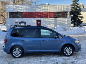 Blue Volkswagen Touran 2011 in Klaipeda, with an engine capacity of 1.39 L and mileage of 250 thousand km for 3999 €, photo 12 on AUTOMOTO.COM.LV